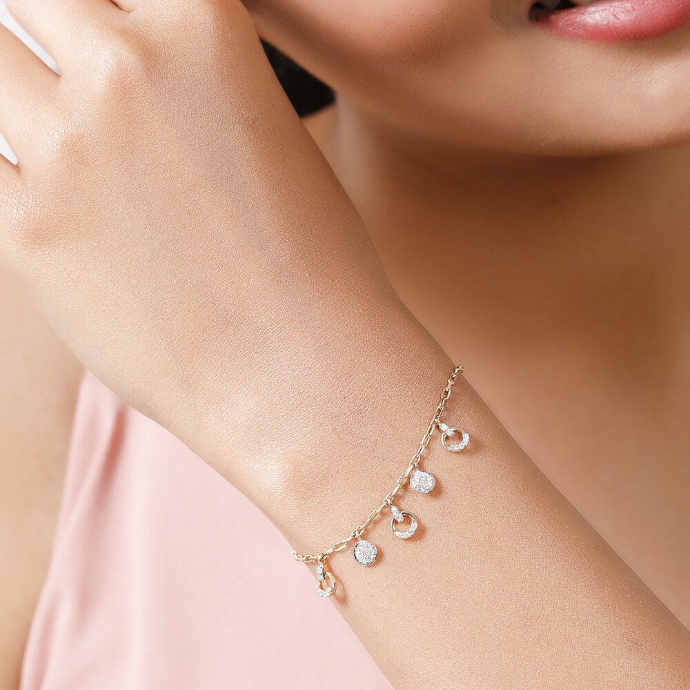 Buy 14KT Yellow Gold Sparkling Wheels Diamond Bracelet Online Mia by Tanishq